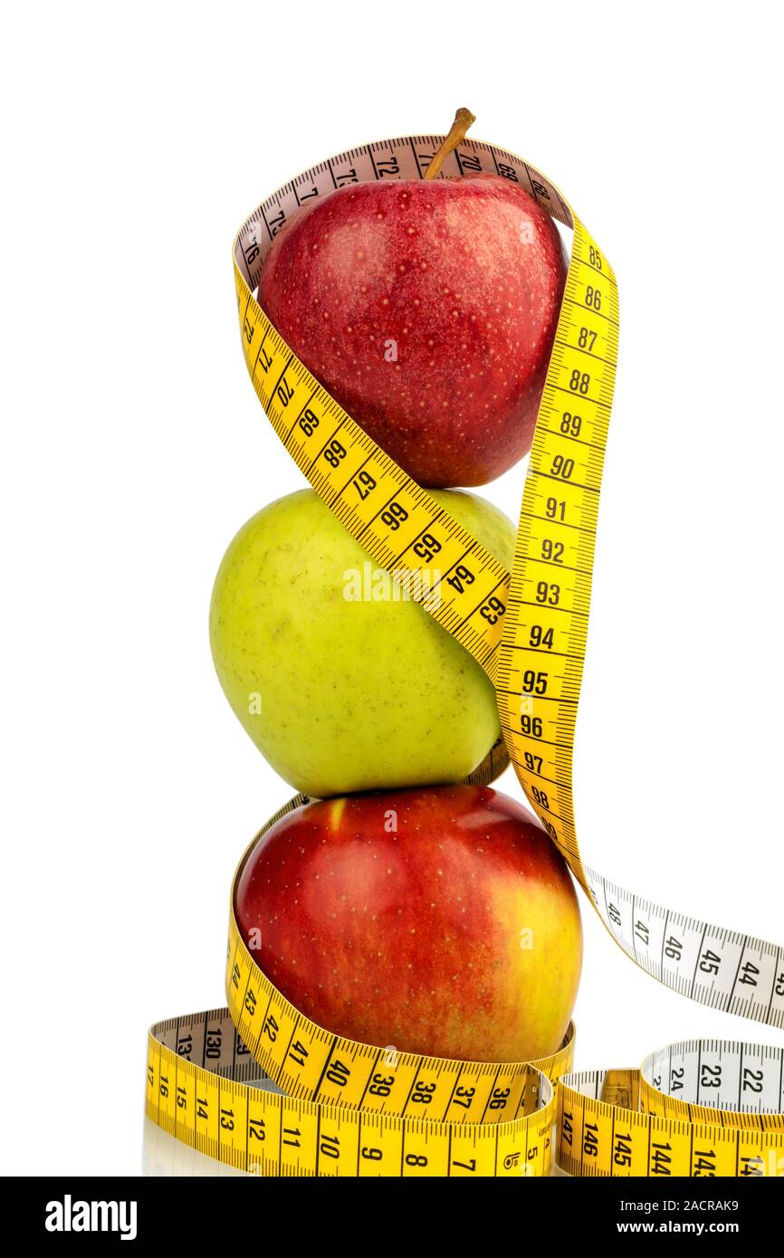Apples on with tape measure Stock Photo - Alamy