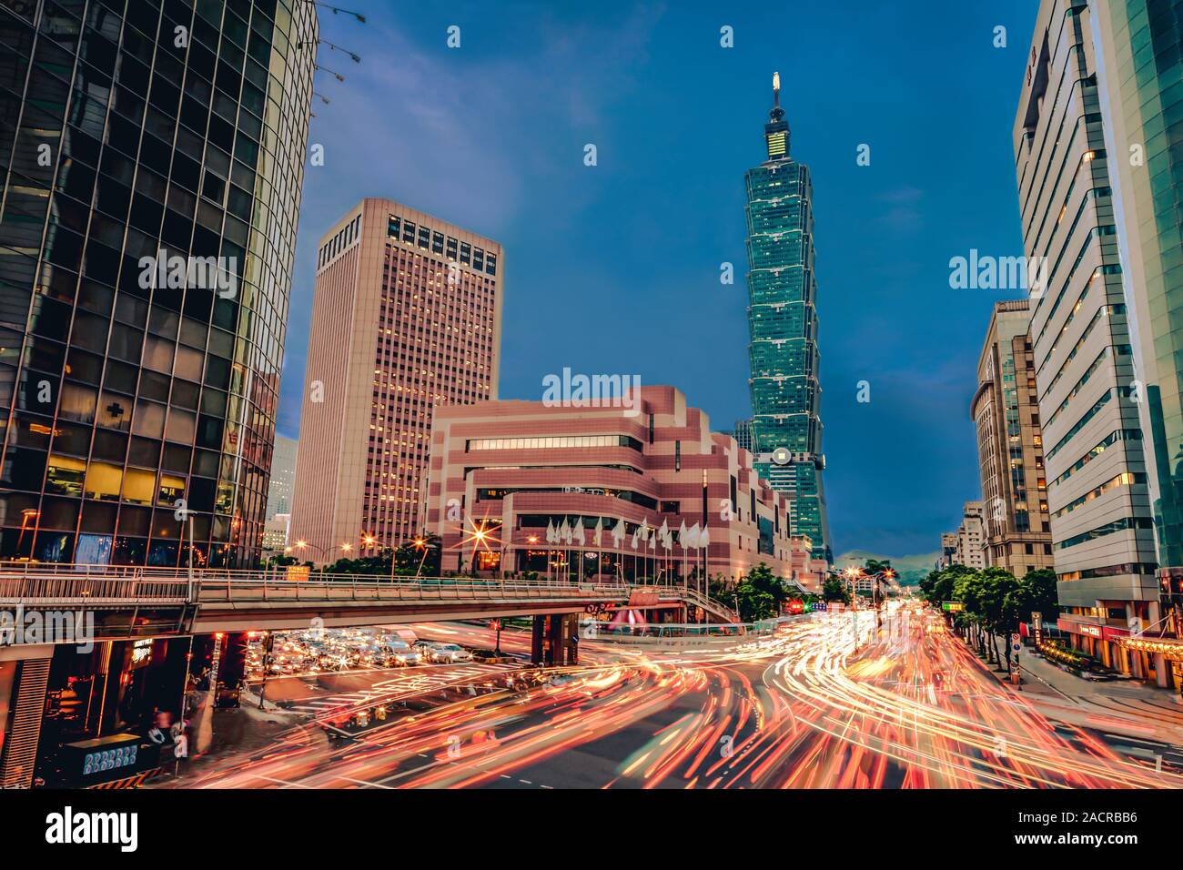 View of Taipei main road from day to night with the famous building 101 ...