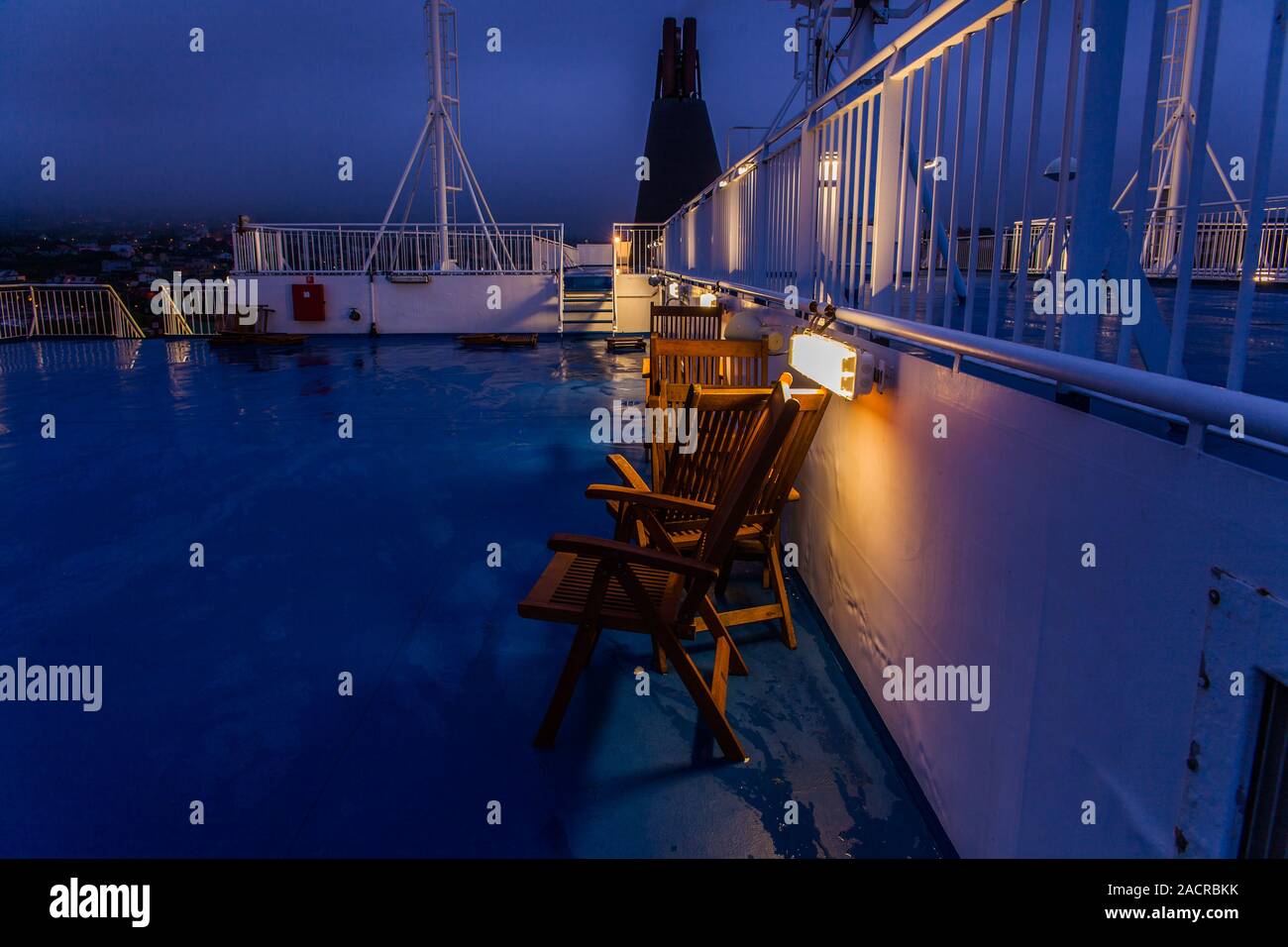 wooden deck chairs on a ferry Stock Photo - Alamy