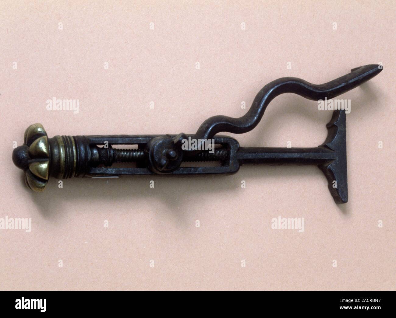 Pelican tooth extractor, made of steel with screw adjustment. These ...