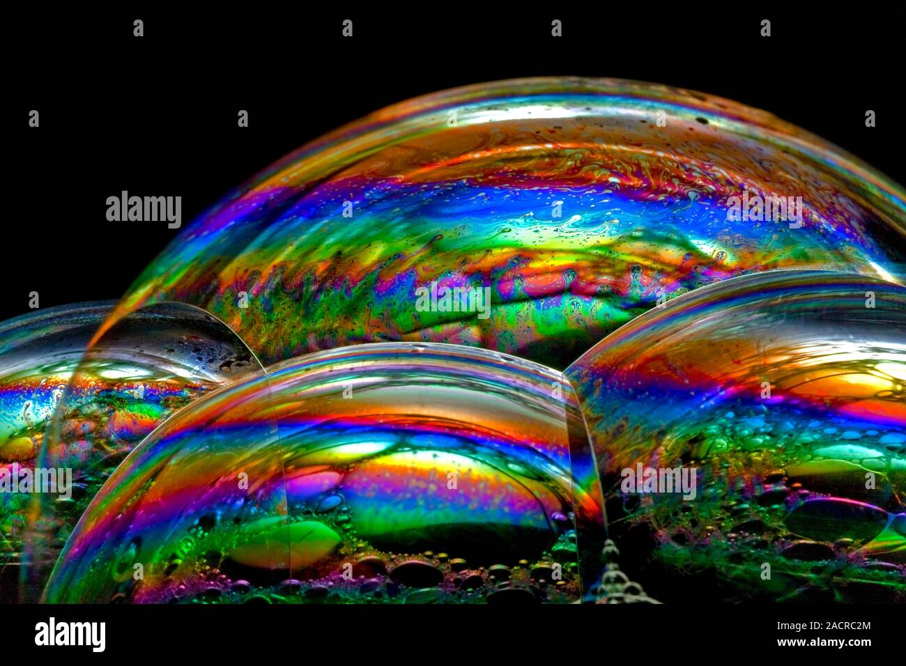 Soap bubble iridescence. Iridescence is the property of certain ...