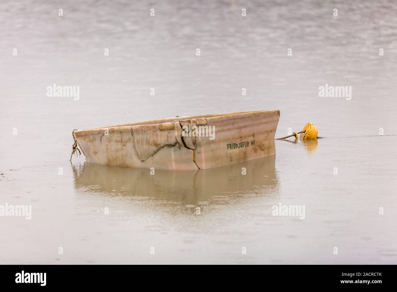 white plastic box floating in the water Stock Photo - Alamy