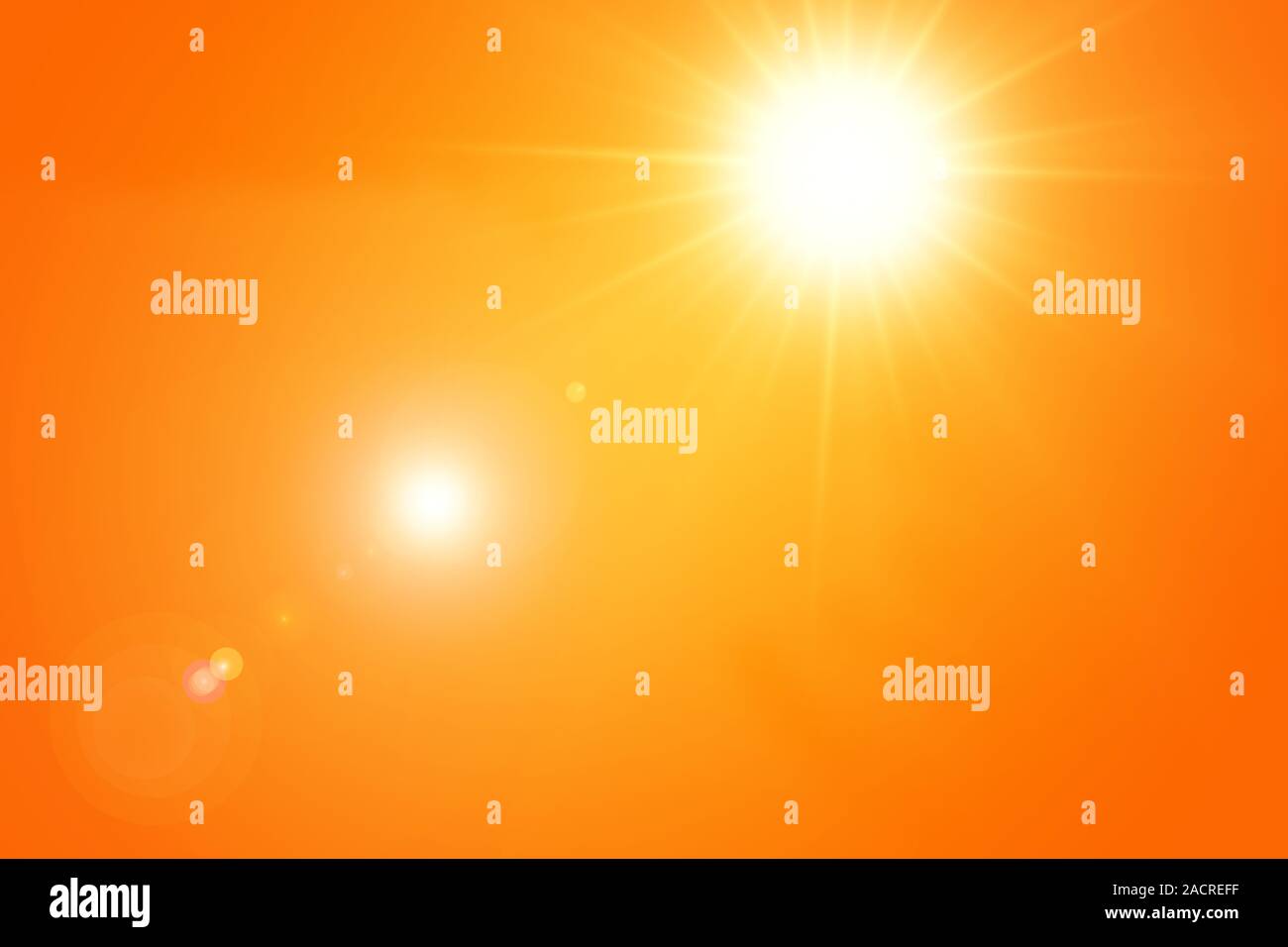 Orange sun with glare spots Stock Photo - Alamy