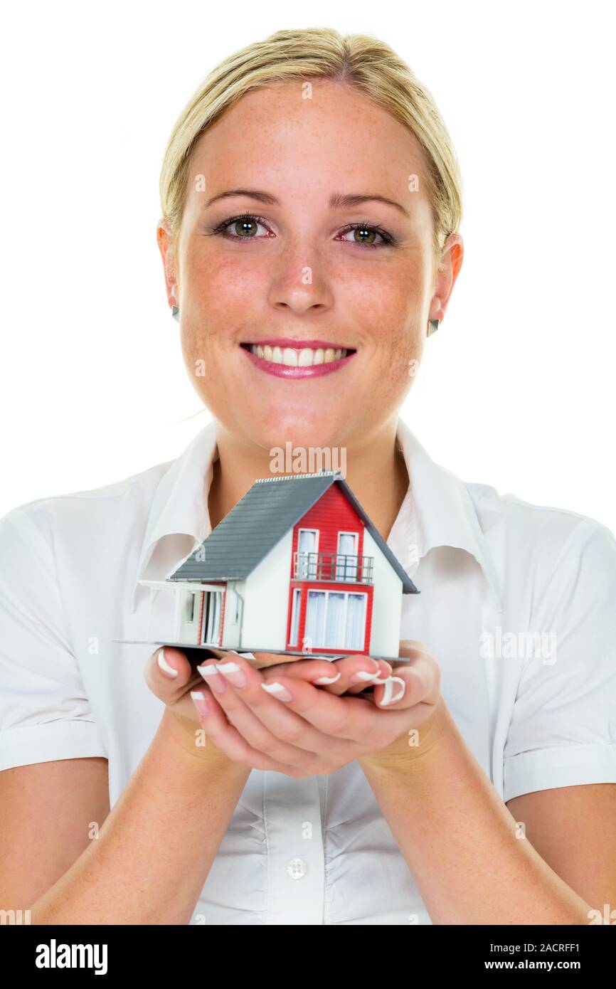 Woman holding house hand hi-res stock photography and images - Alamy