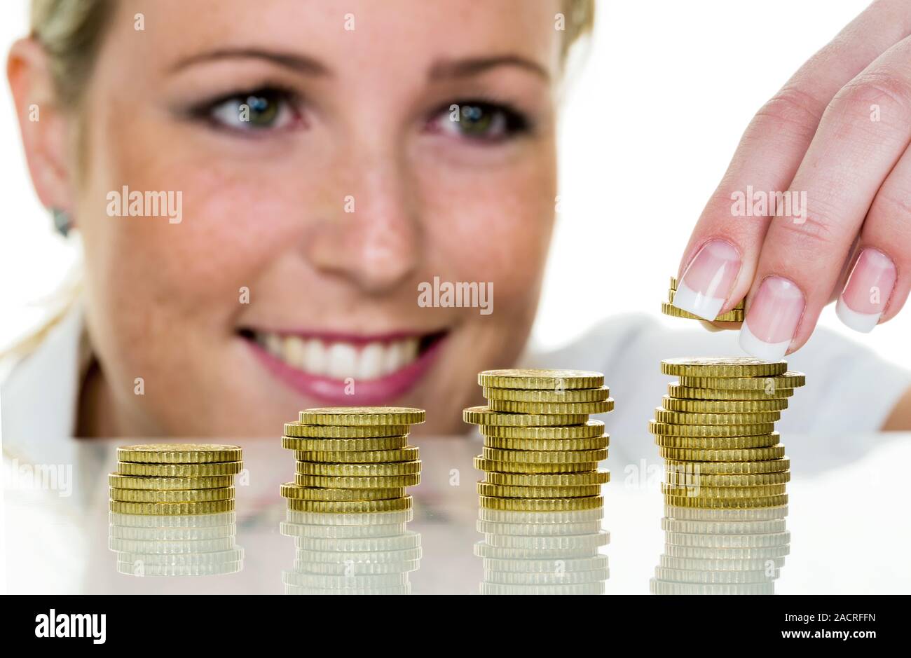 Woman with coins hi-res stock photography and images - Alamy