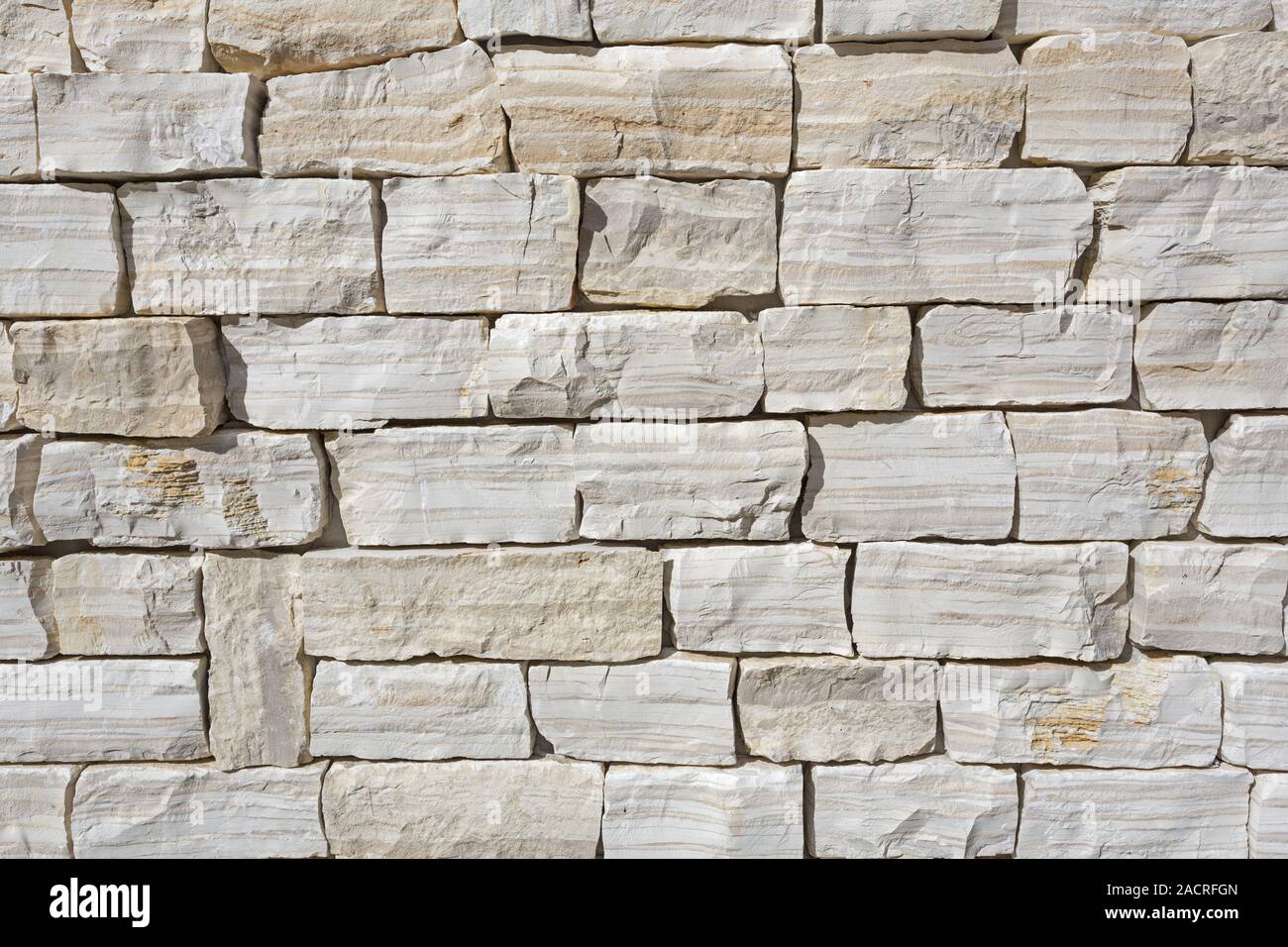 New stone wall as background Stock Photo - Alamy