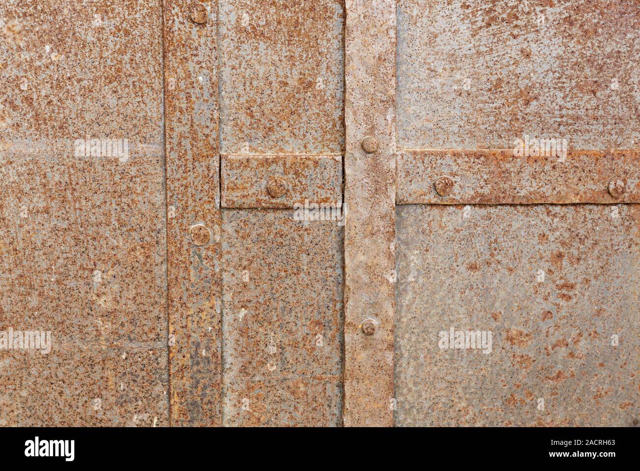 Rusty sheet metal with reinforcing tapes as background Stock Photo - Alamy