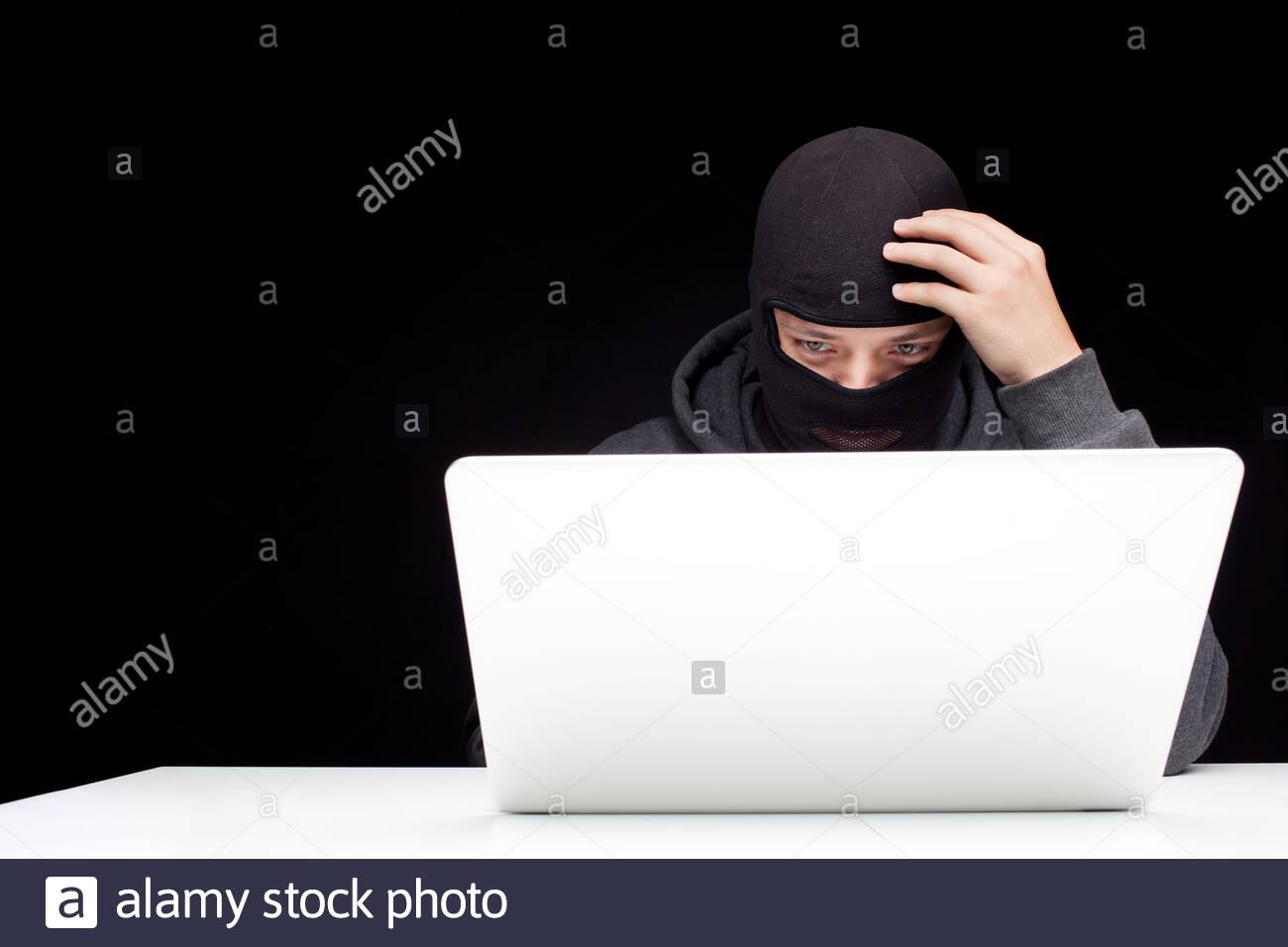 Male Computer Hacker Stock Photos & Male Computer Hacker Stock Images ...