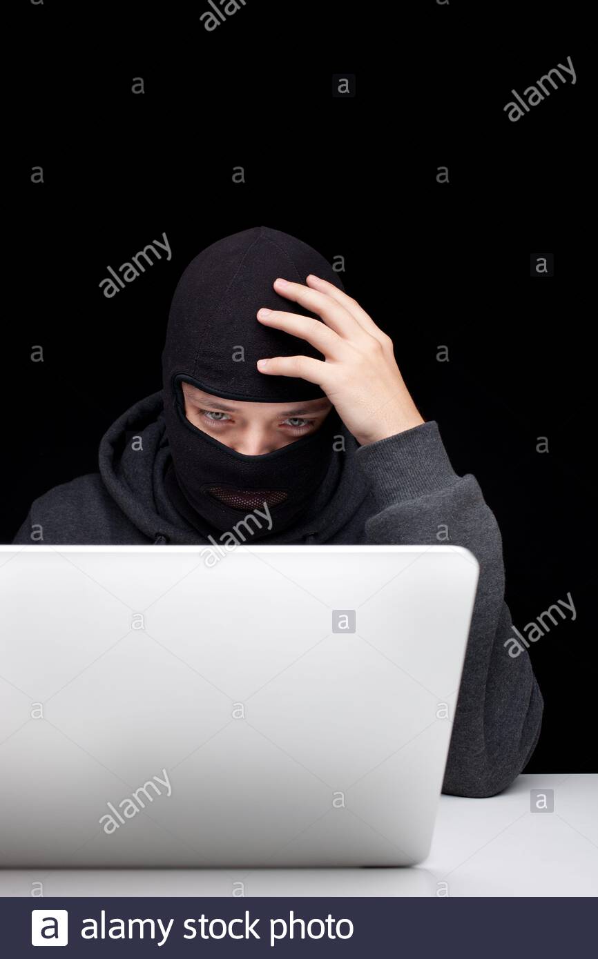 Male Computer Hacker Stock Photos & Male Computer Hacker Stock Images ...