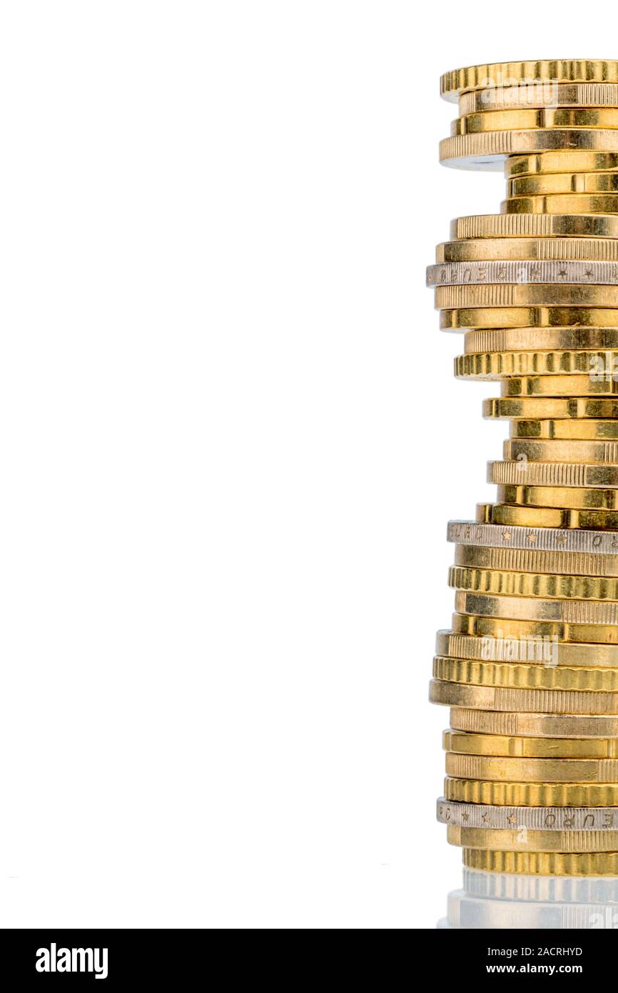 Stack of money coins against a white background Stock Photo - Alamy