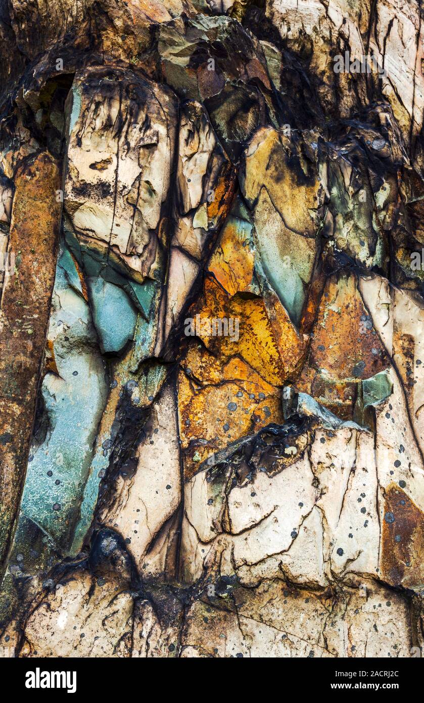 Tuff volcanic rock and mineral deposits, close-up. These laminated ...