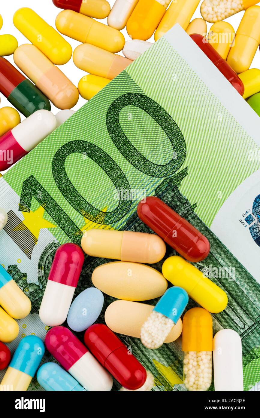 Euro banknotes and tablets Stock Photo - Alamy