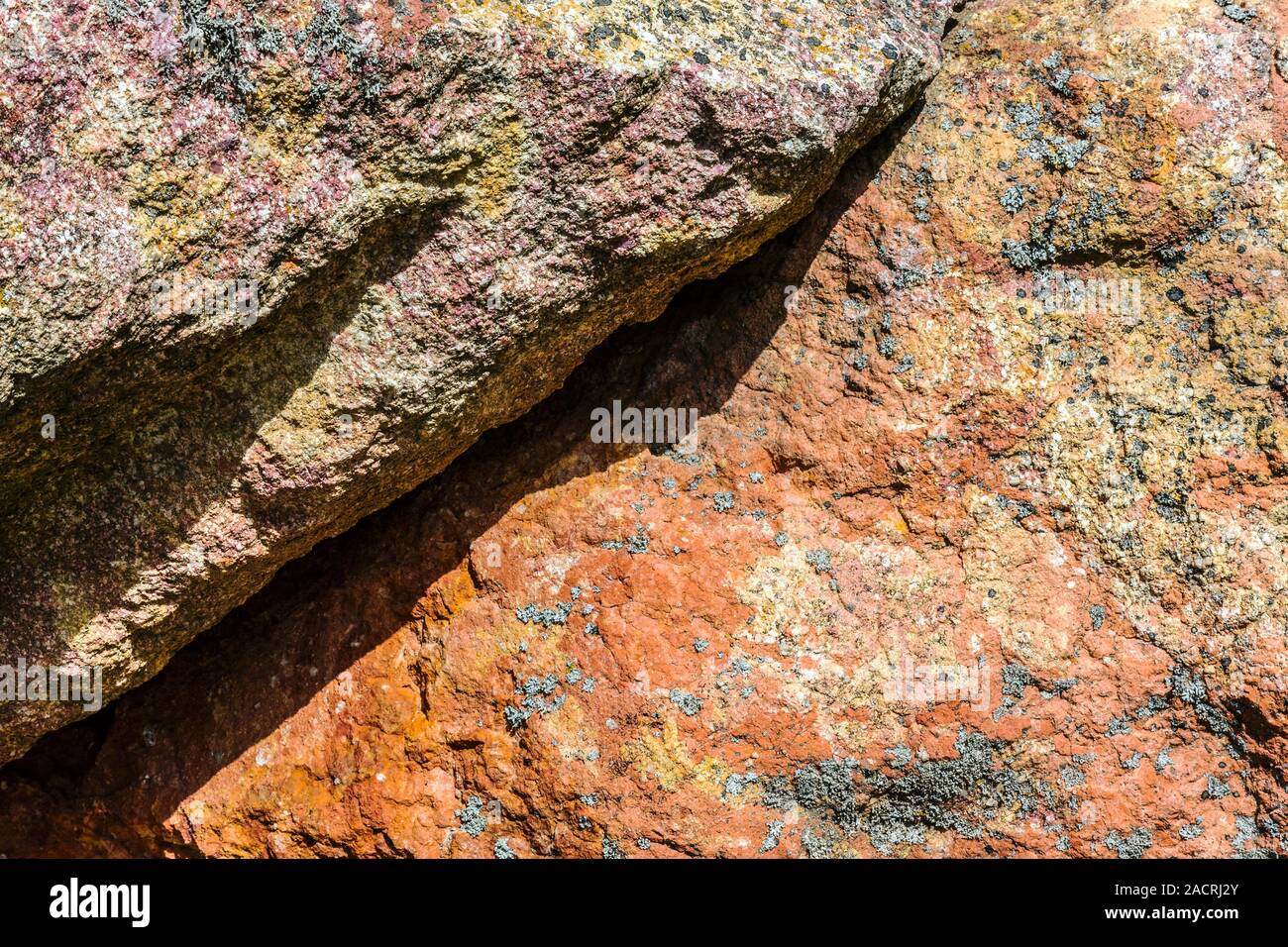 Red and white sandstone, close-up. This detrital sedimentary rock ...