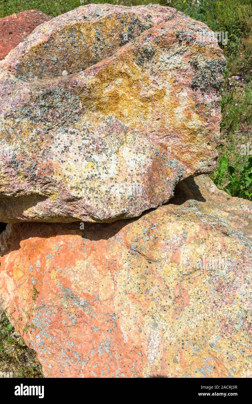 Red and white sandstone. This detrital sedimentary rock sample contains ...