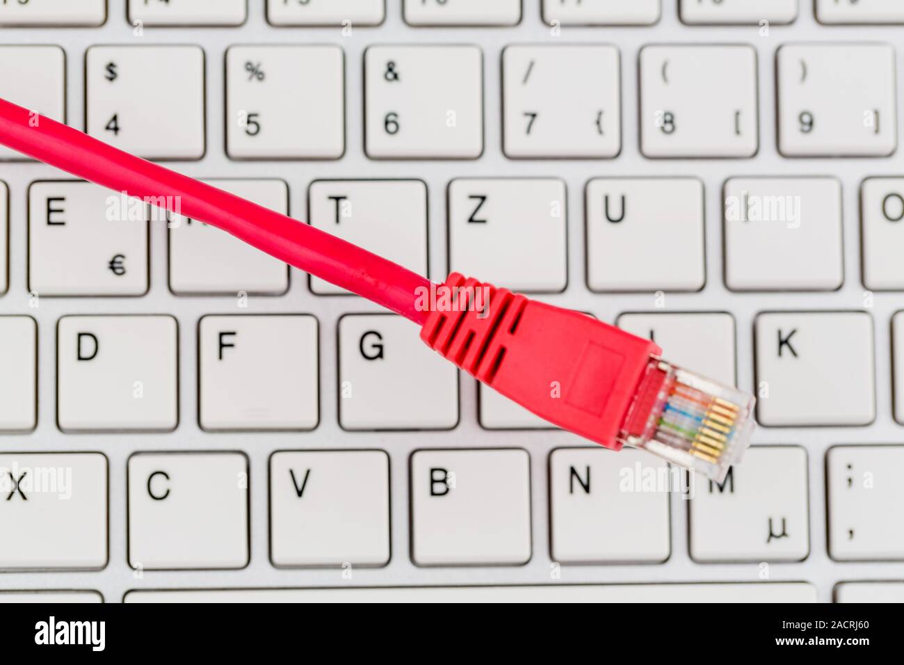 Network cable to keyboard Stock Photo - Alamy
