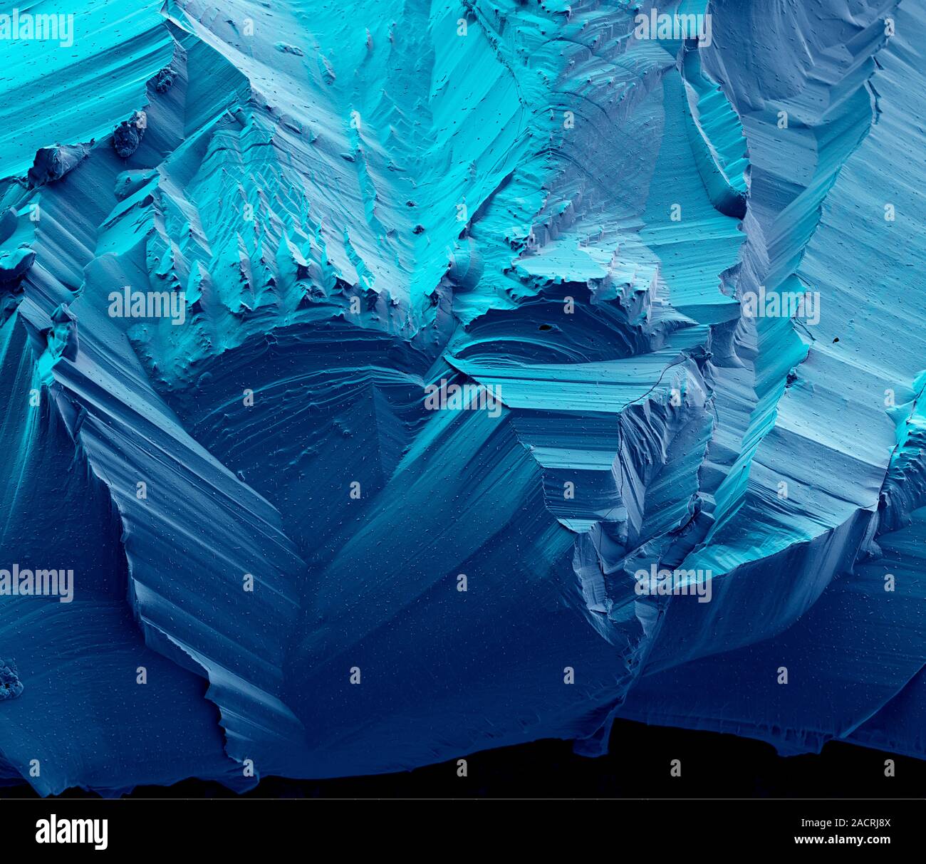 Sodium nitrate crystals, coloured scanning electron micrograph (SEM ...