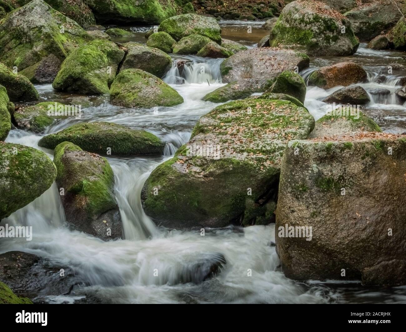 Stream with running water Stock Photo - Alamy
