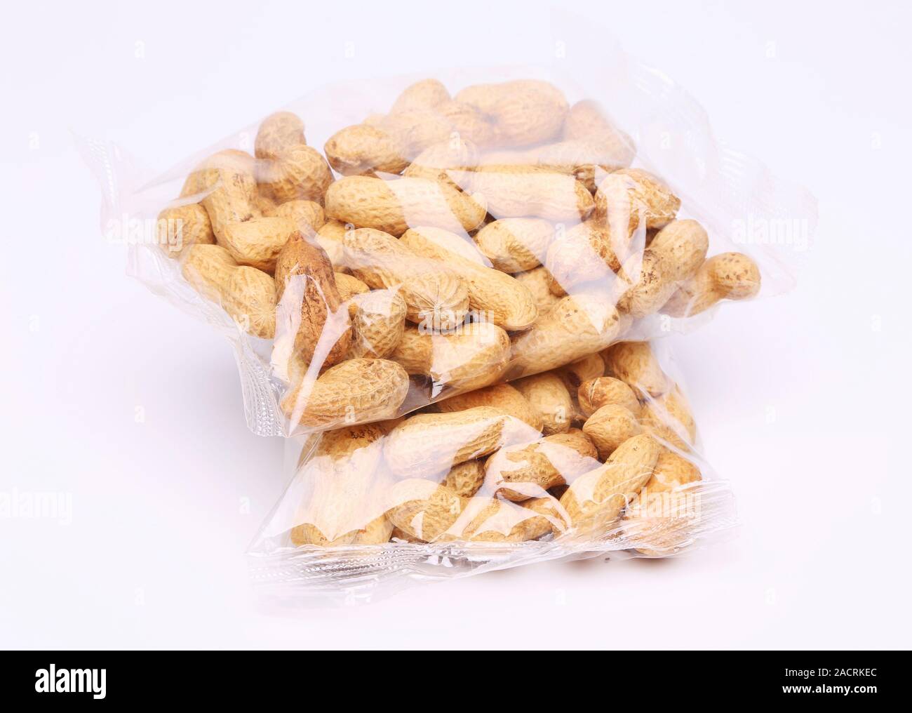 Two plastic bags of peanuts Stock Photo - Alamy