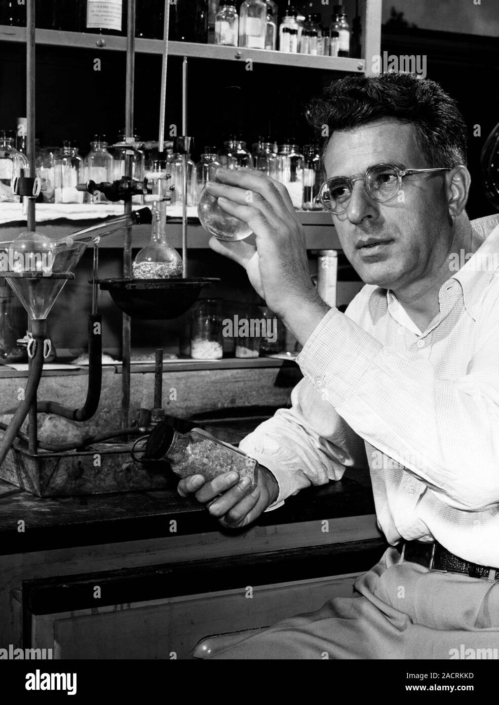 Early nylon research. DuPont research chemist working with nylon 6-6 ...