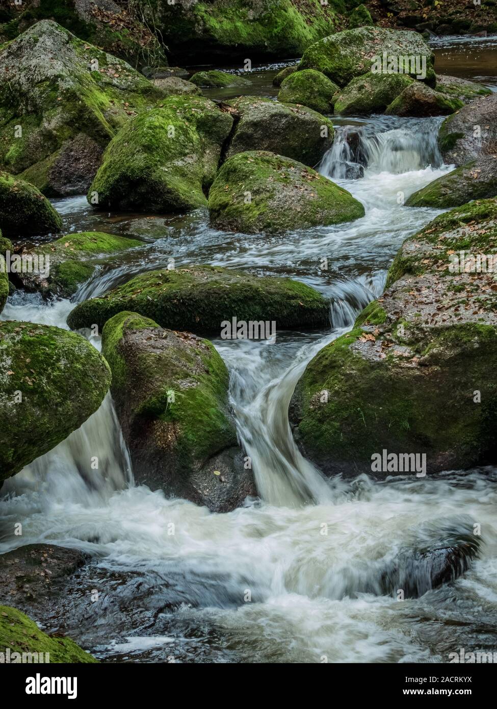 Stream with running water Stock Photo - Alamy