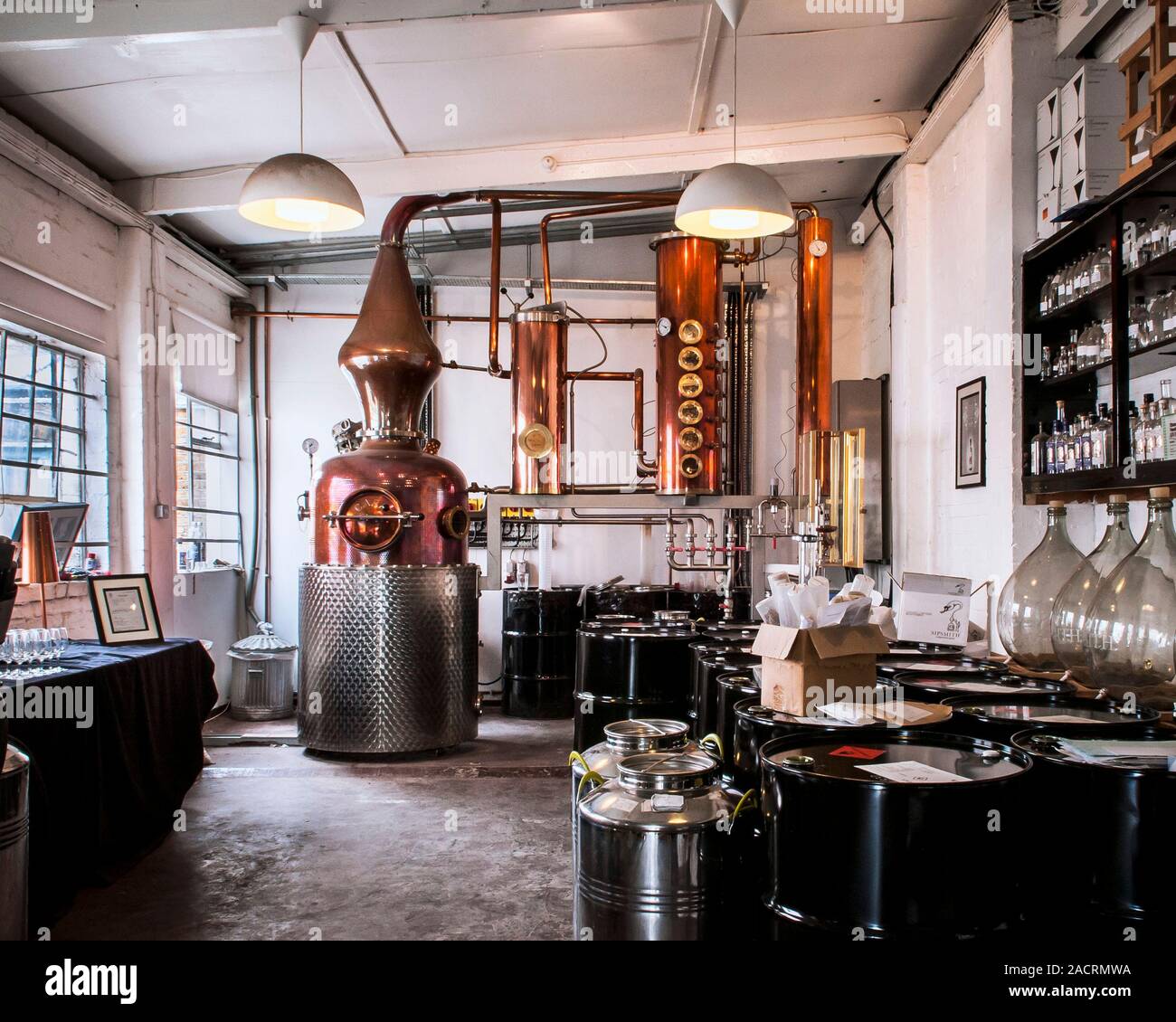 Gin distillery, with a copper still (centre left). Photographed at ...
