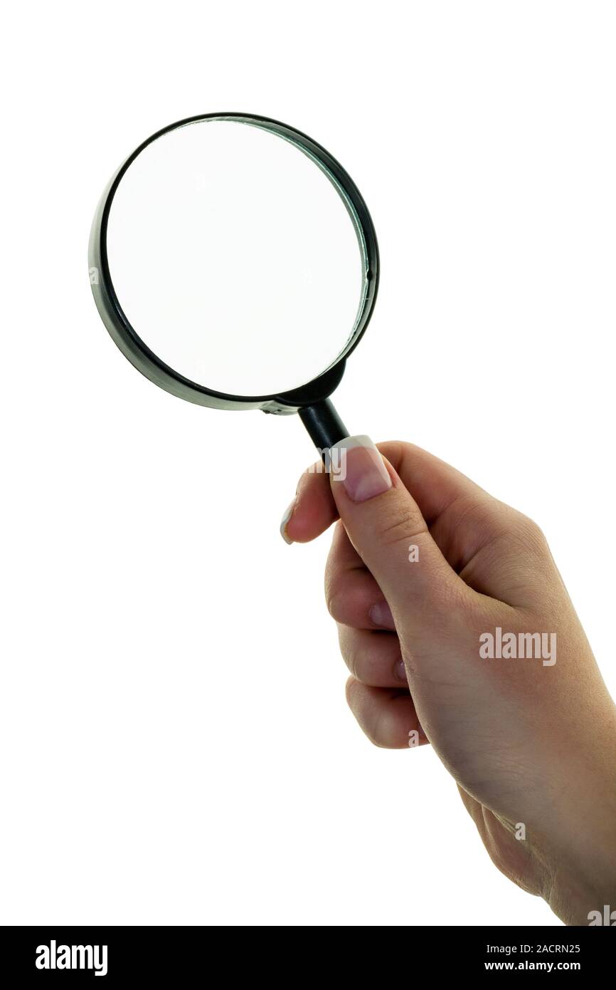 Hand with a magnifying glass Stock Photo - Alamy