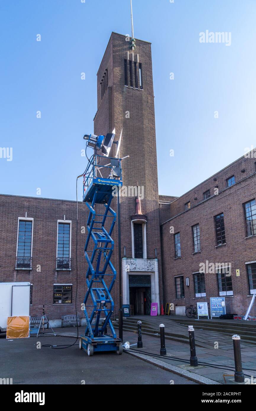 Arri D40 HMI fresnel lamphead on a scissor lift rigged for a film shoot ...