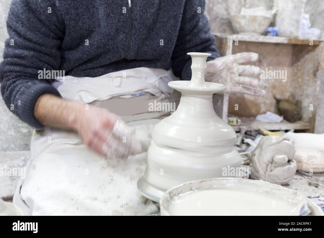 Potter at work in a pottery Stock Photo - Alamy