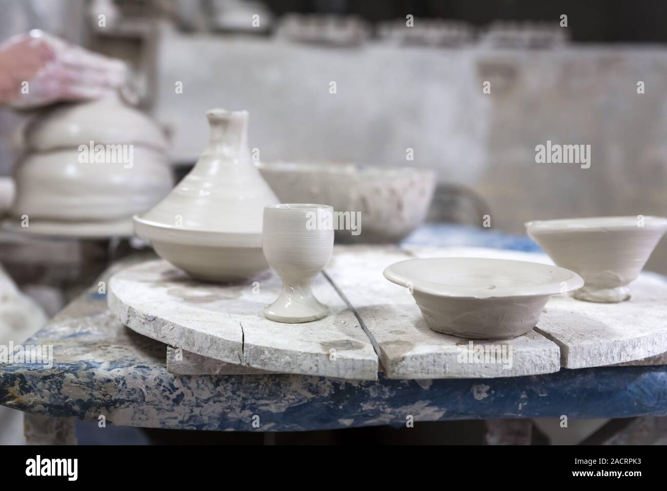 Potter at work in a pottery Stock Photo - Alamy