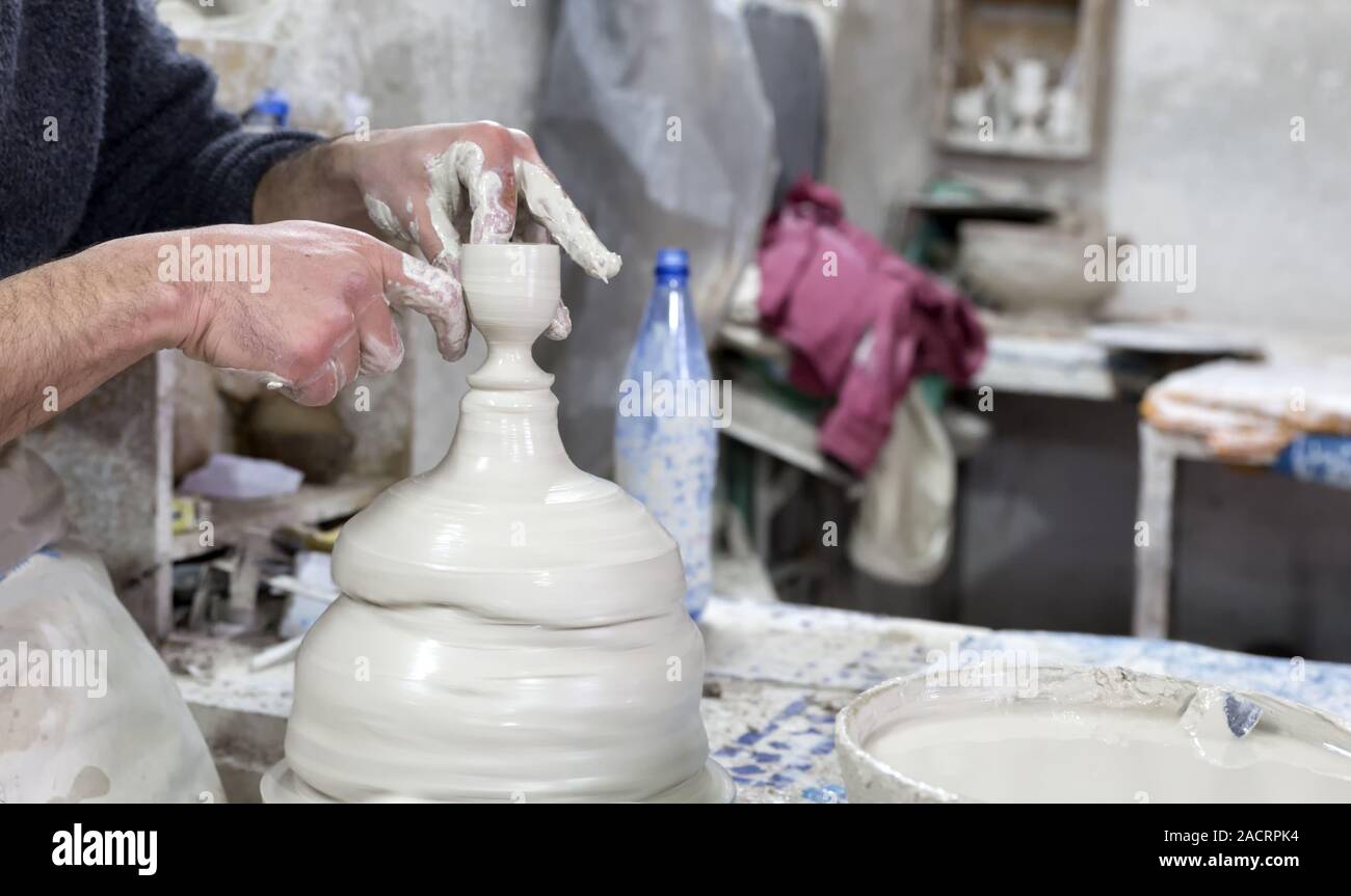 Potter at work in a pottery Stock Photo - Alamy