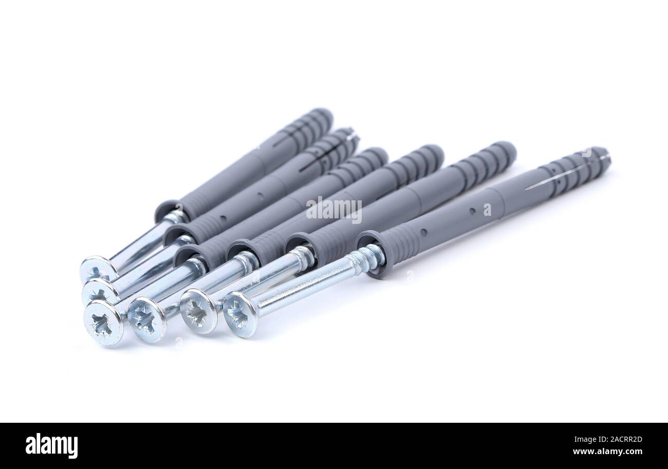 Screws and dowels isolated on white background Stock Photo - Alamy