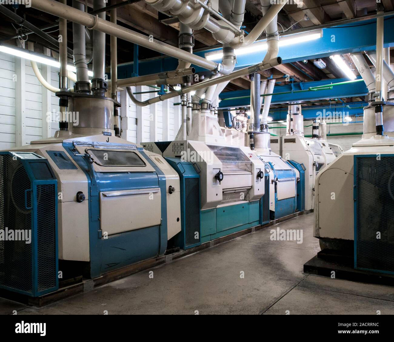 Flour mill machinery. Photographed at Marriage's flour mill, Chelmsford ...