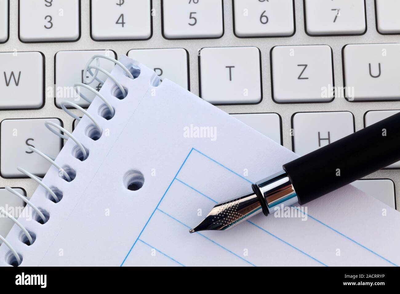 Notebook and keyboard of a computer Stock Photo - Alamy