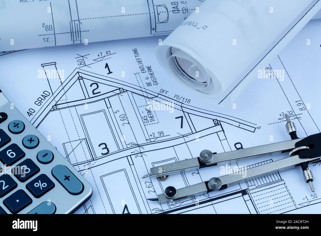 House plan with pocket calculator Stock Photo - Alamy