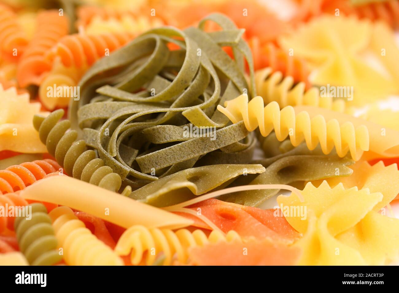 different pasta in three colors Stock Photo - Alamy