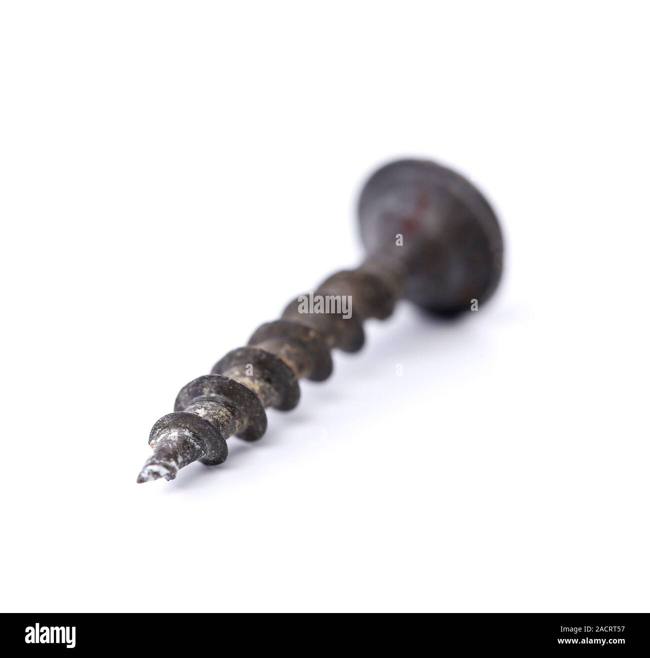Screw is located on a white background Stock Photo - Alamy