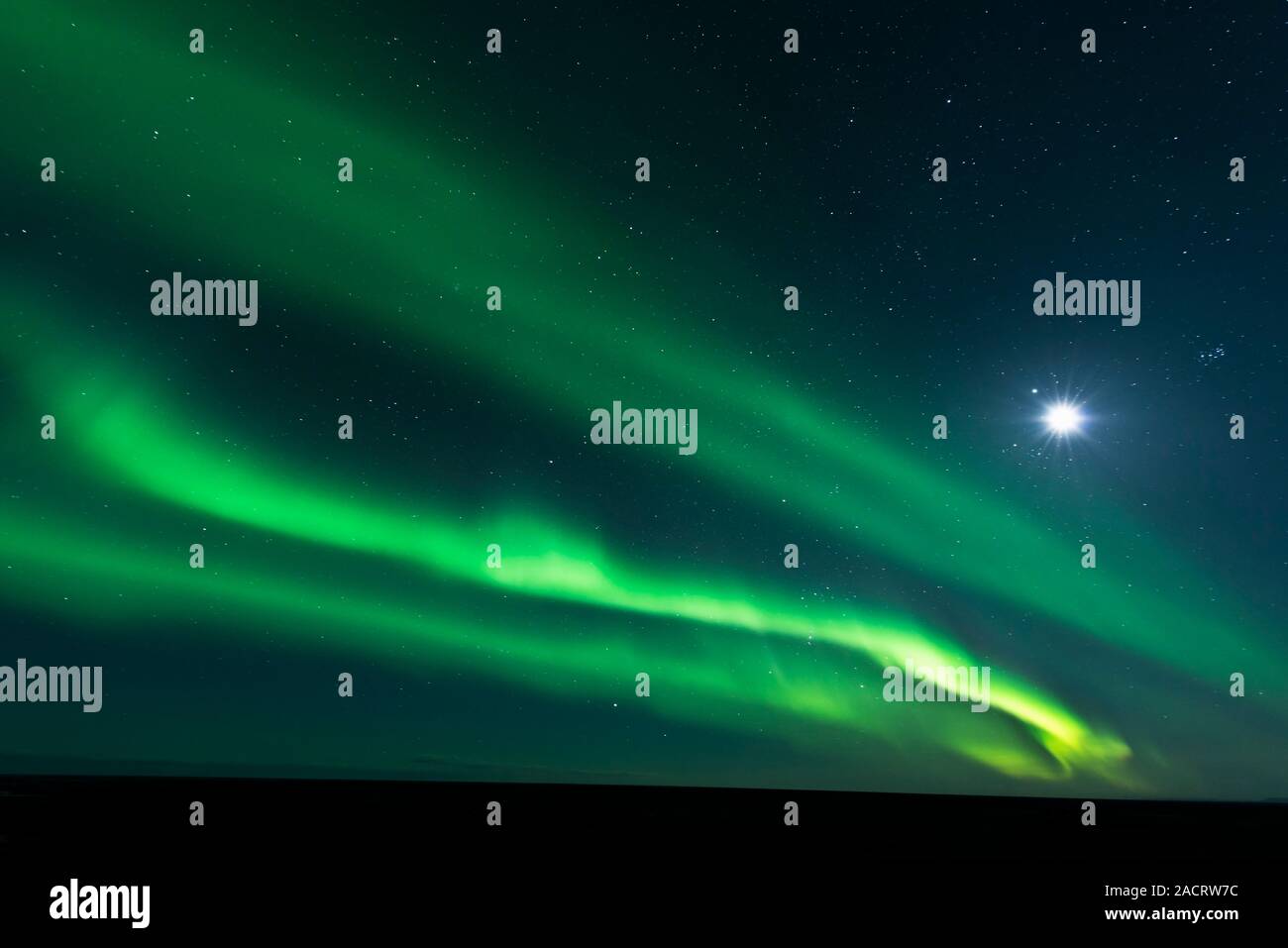 Northern lights, or Aurora Borealis, and a full Moon. Auroral displays ...