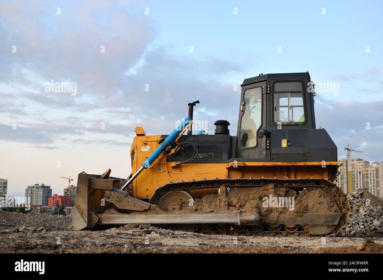 Track-type bulldozer, earth-moving equipment. Land clearing, grading ...