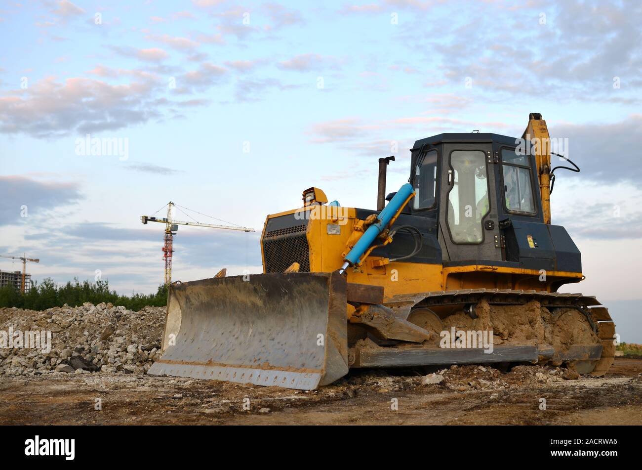 Track-type bulldozer, earth-moving equipment. Land clearing, grading ...