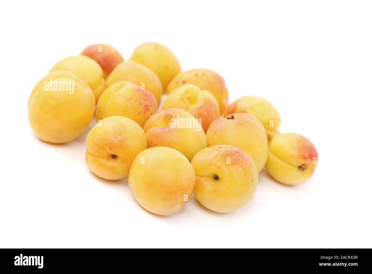 lot of fresh apricots isolated Stock Photo - Alamy