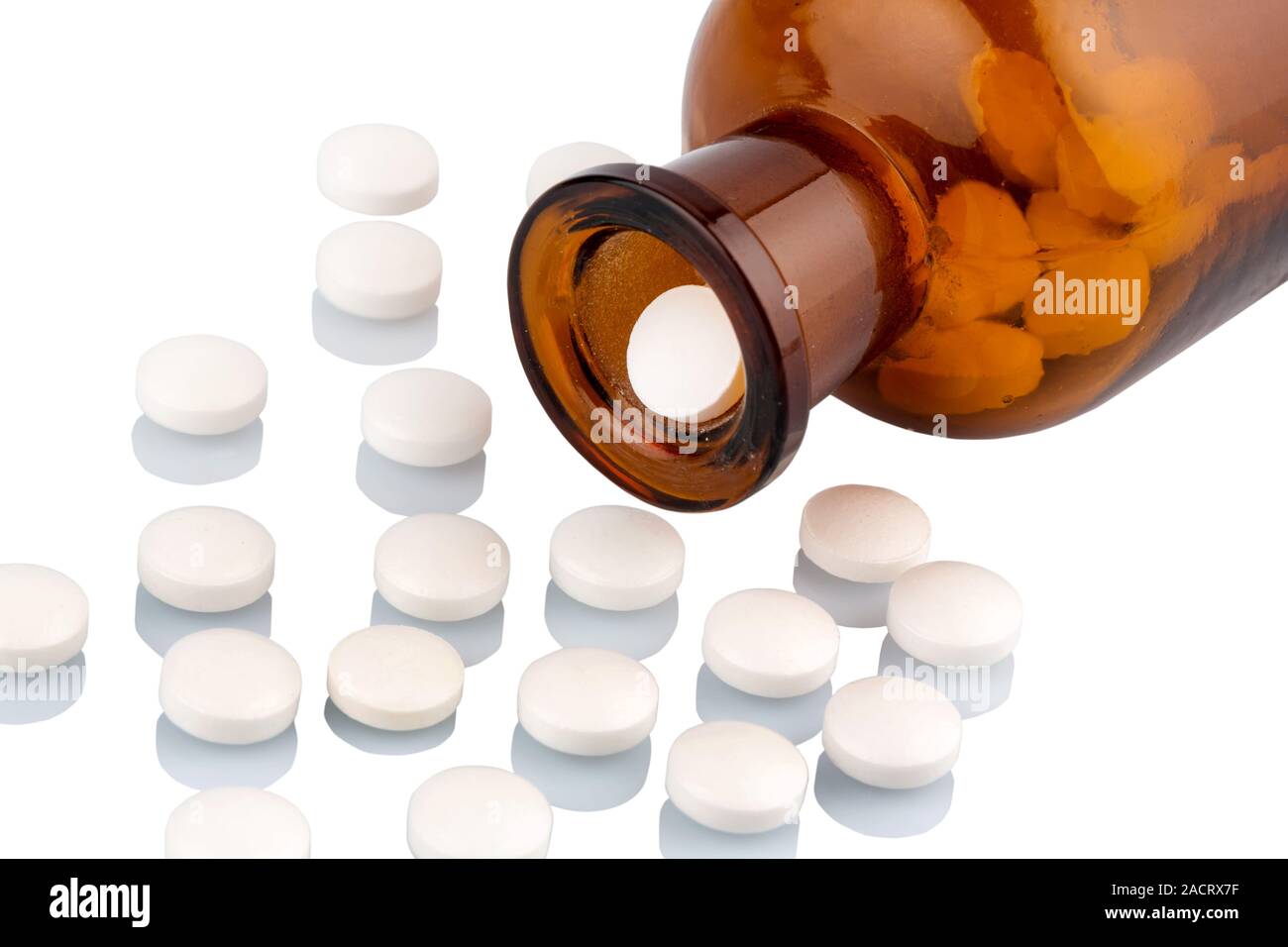 Many tablets with container Stock Photo - Alamy