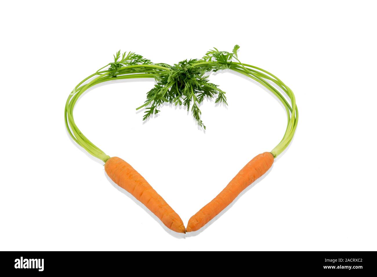 Fresh heart-shaped carrots Stock Photo - Alamy