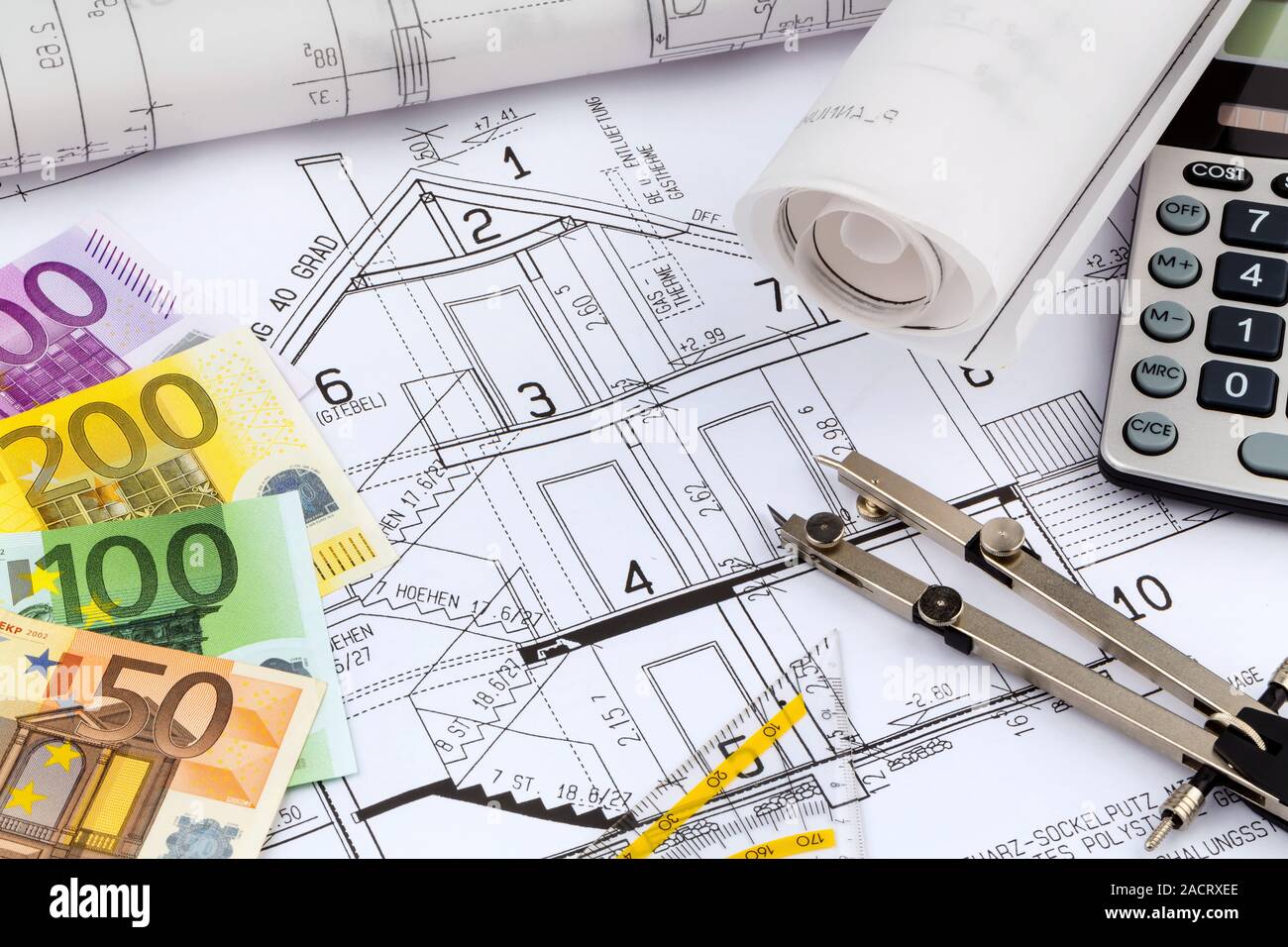 House plan with pocket calculator Stock Photo - Alamy