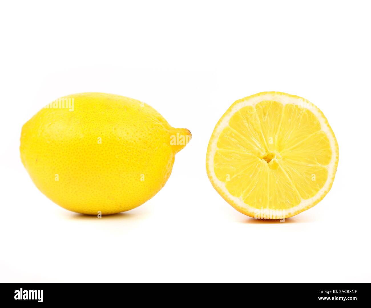 Lemon and slice isolated on white background Stock Photo - Alamy