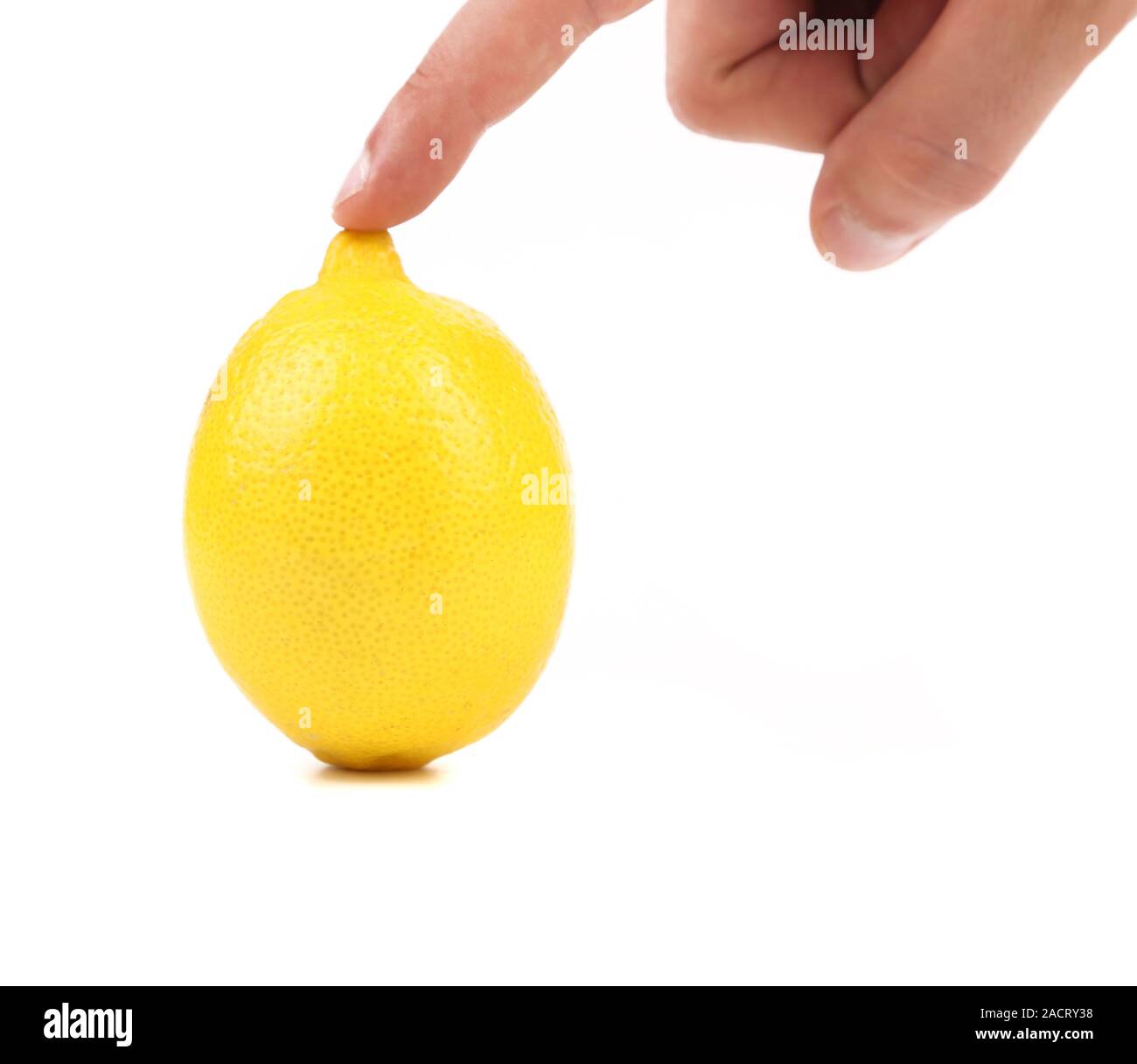 Lemon and hand isolated on a white background Stock Photo - Alamy