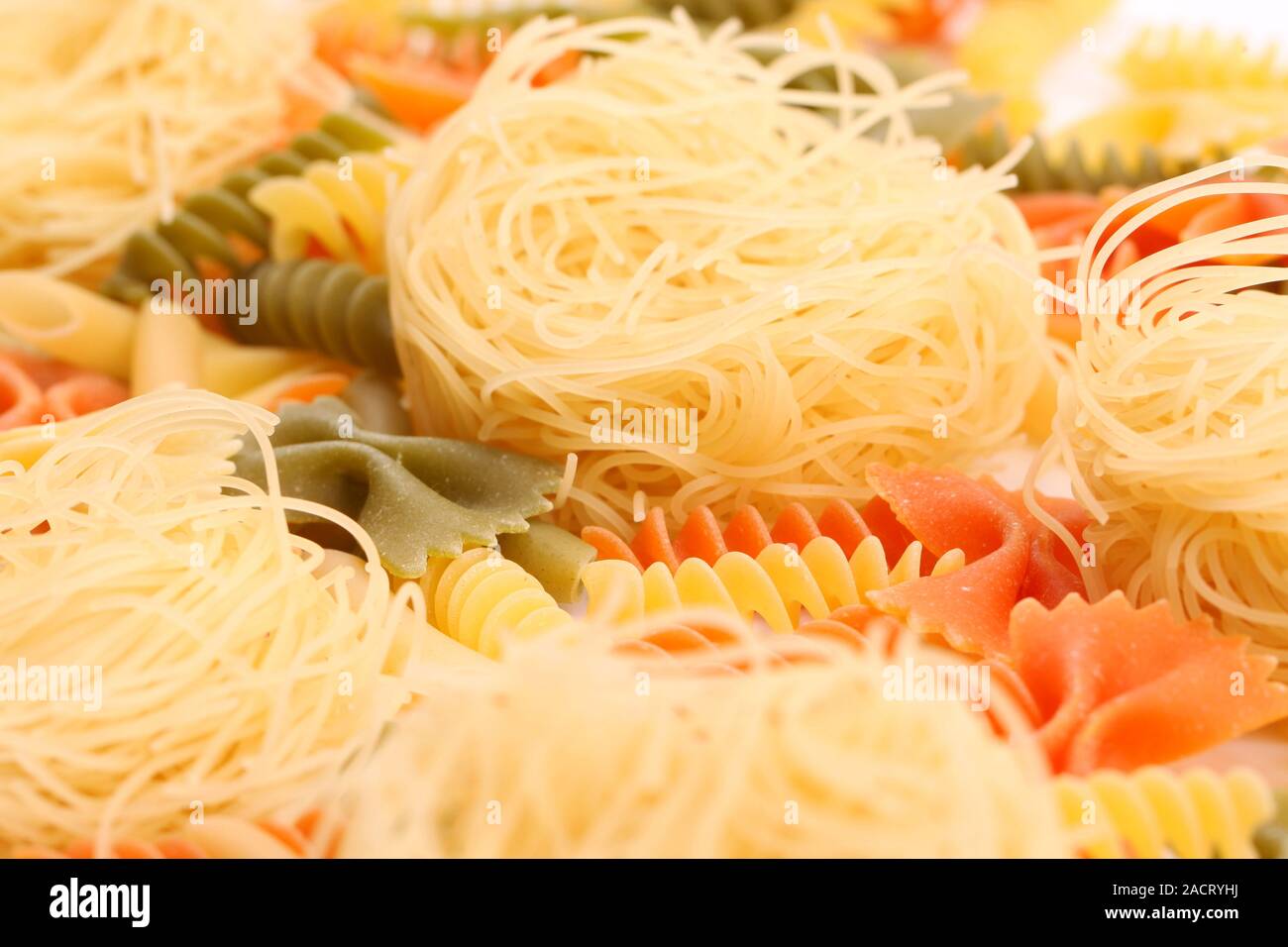 different pasta in three colors Stock Photo - Alamy