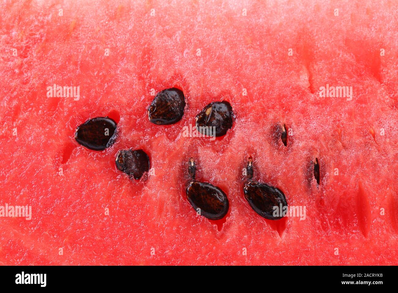 Slice of watermelon. Close up. Whole background Stock Photo - Alamy