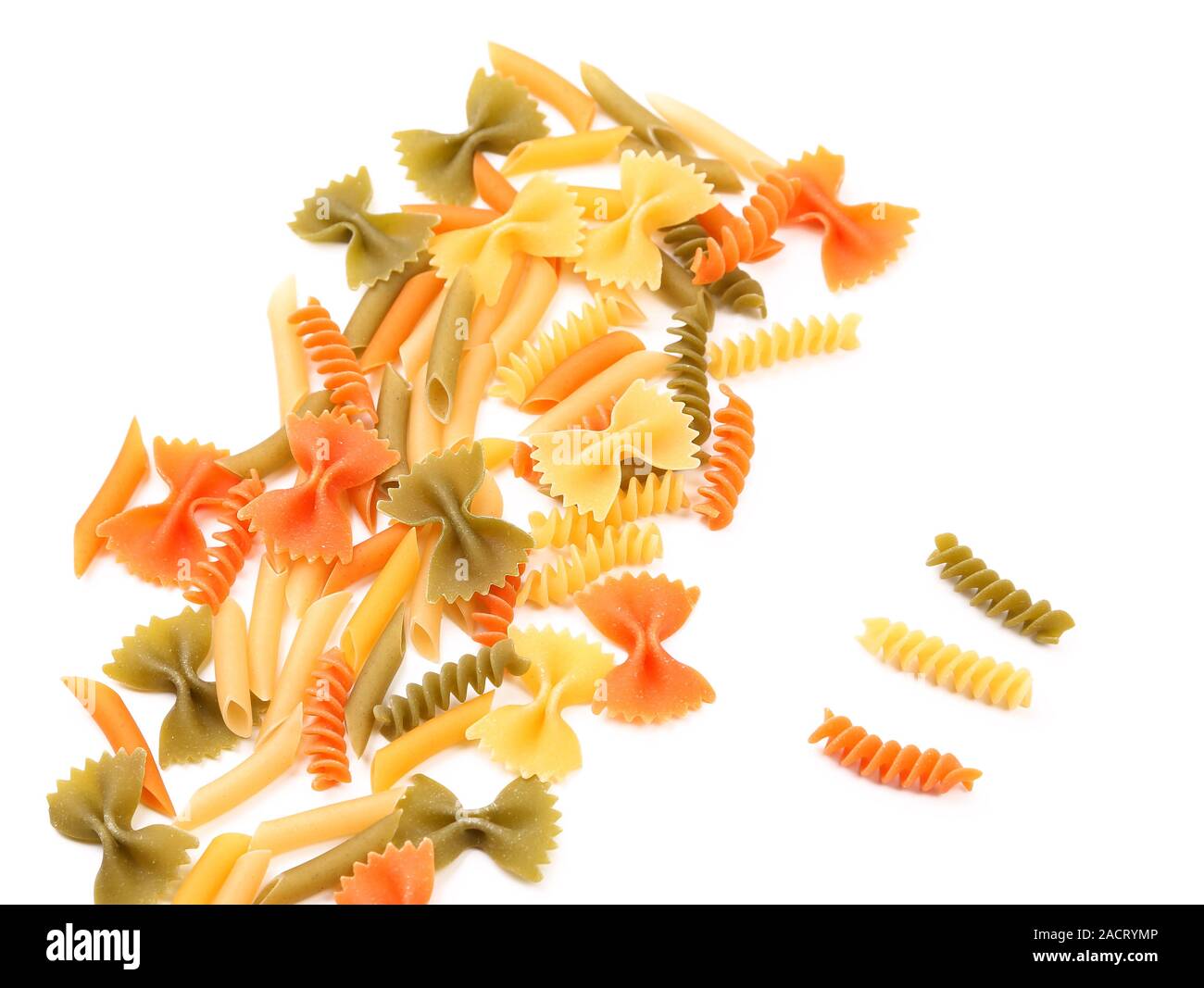 Different pasta in three colors close-up Stock Photo - Alamy
