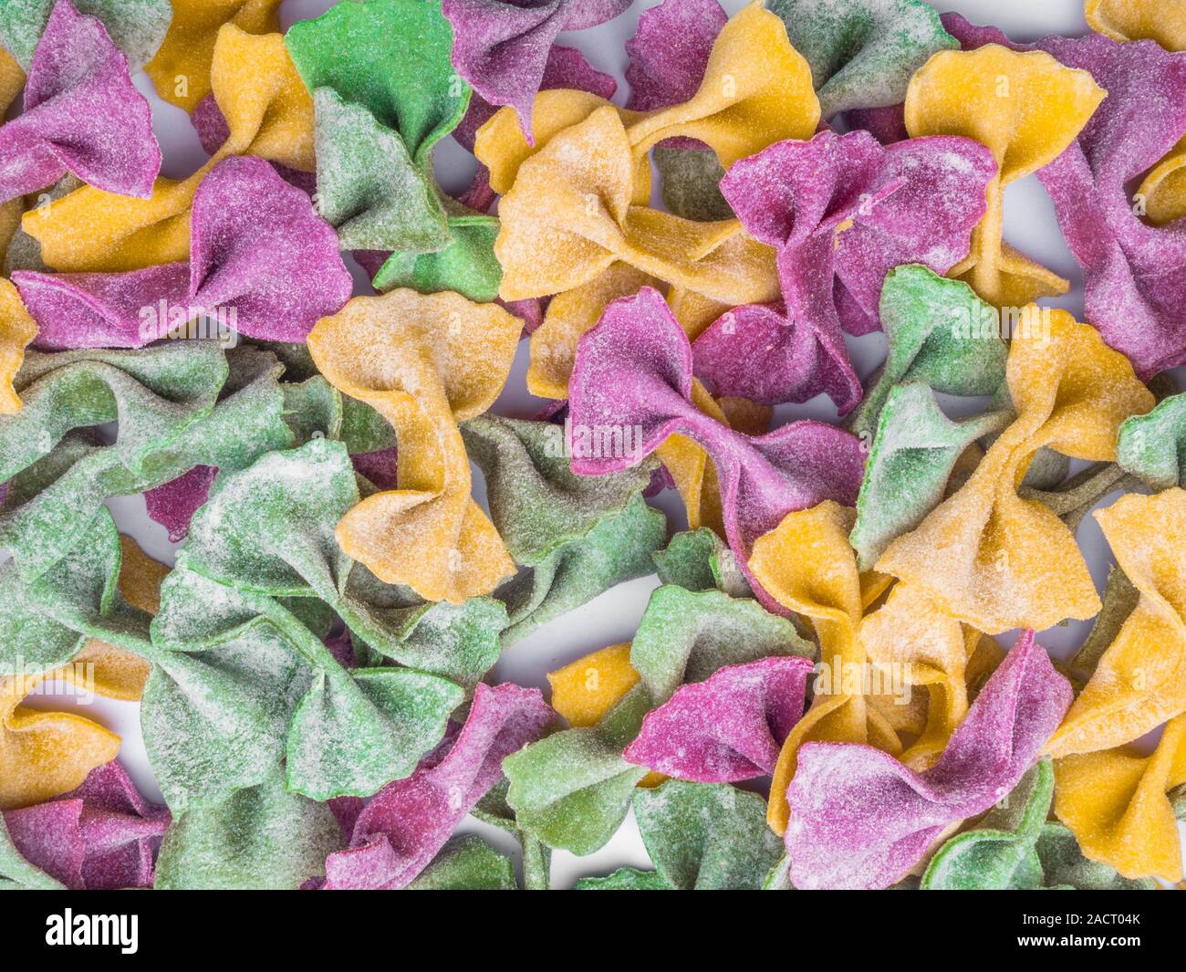 Pile of Italian dried Tri Color Farfalle pasta background, Various ...