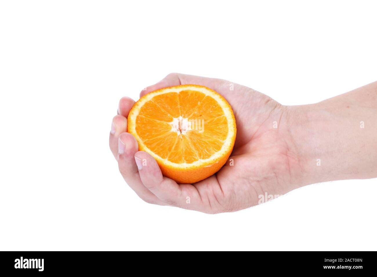 Human hand holding half orange hi-res stock photography and images - Alamy